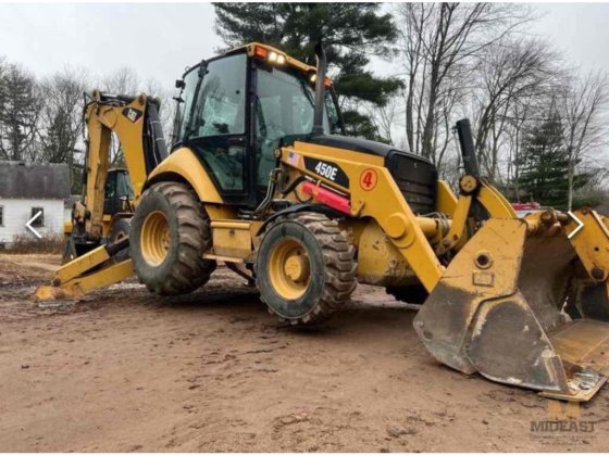 2009 CATERPILLAR 450E BACKHOE LOADER in Miami, FL, USA
