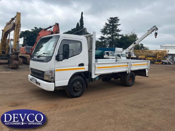 2007 Mitsubishi Fuso Canter FE6-106 Dropside Truck in South Africa
