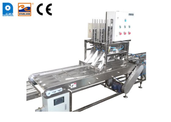 Automatic Cone Sleeving Device Cone sleeve release controlled by ...