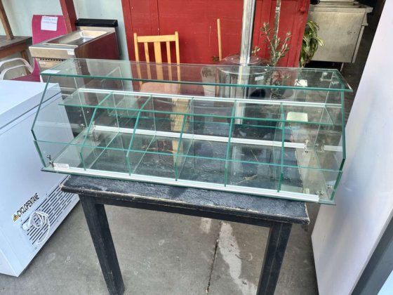 Glass shelf - display case with partitions in Athens, Greece
