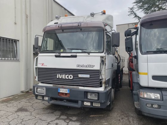1990 Flatbed truck FIAT 190 48 with crane tg. BP694NK in Milan, Italy