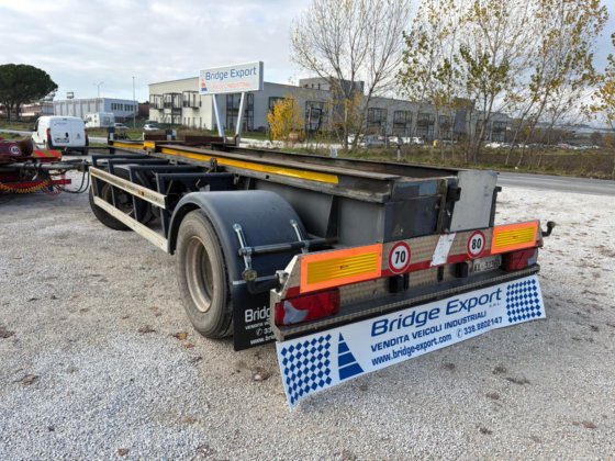 1998 BARTOLETTI trailer with roll-off system in Tolentino, Marche, Italy