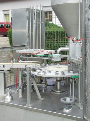 2-piston, 2-row carousel dispenser for plastic and aluminum packaging ...