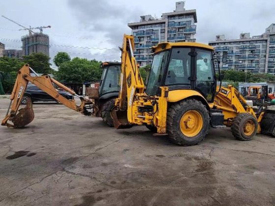 JCB 3CX and CASE 580 backhoe loader in Shanghai, China