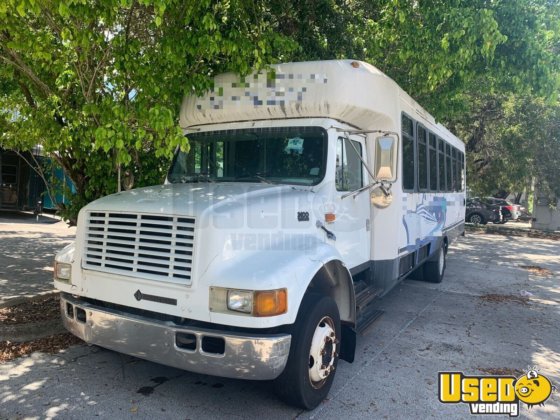 1997 International 3400 T444E 33 Passenger Shuttle Bus in Florida, USA