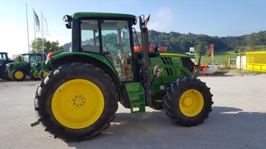 John Deere 6115M: Prices, Specs, and Trends
