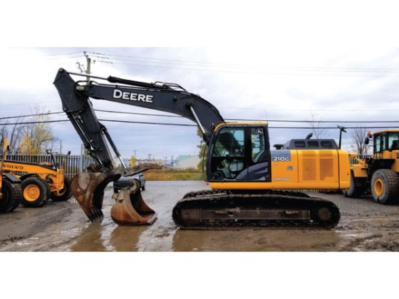 John Deere 210G: Prices, Specs, and Trends