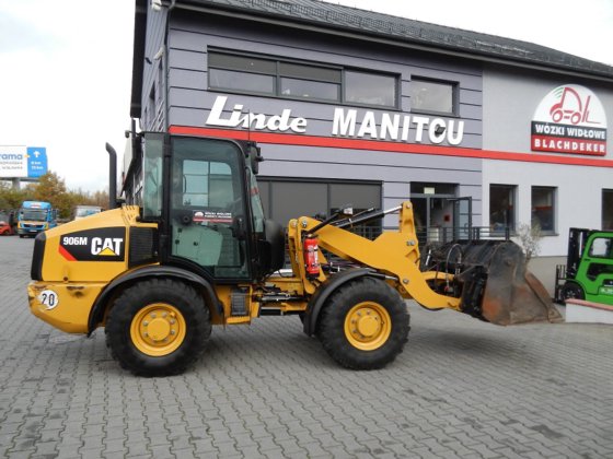 2016 Caterpillar (CAT) 906M in Mogilany, Lesser Poland, Poland