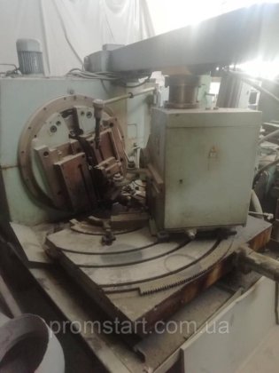 Semi-automatic tooth milling machine for bevel wheels with circular ...