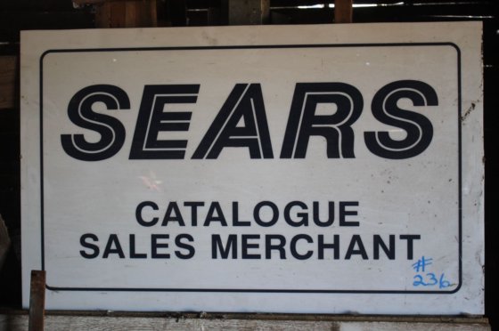 2- UFA signs, sears sign, road signs in Willingdon, Alberta, Canada